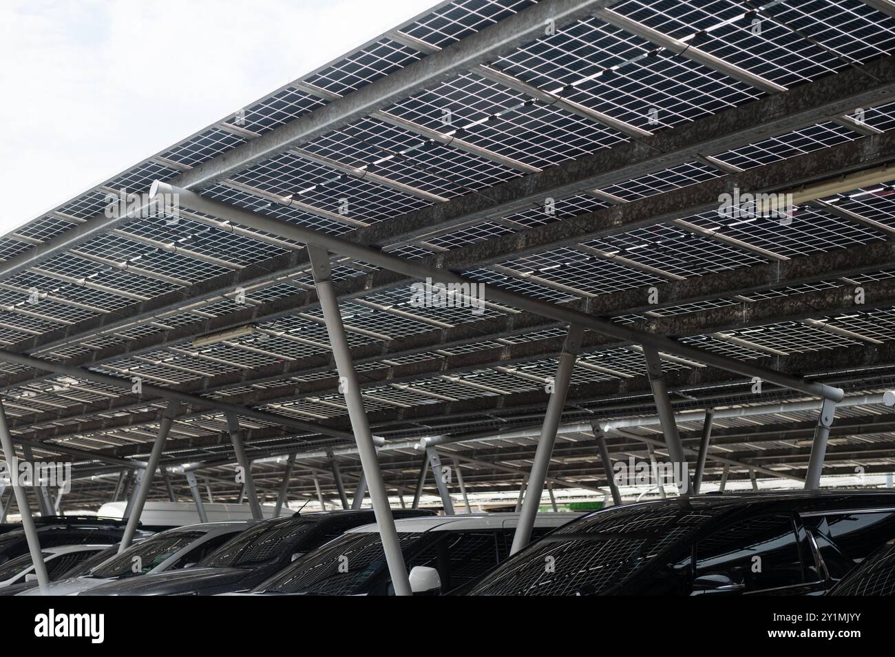Solar panels installed on roof of car parking lot Stock Photo - Alamy