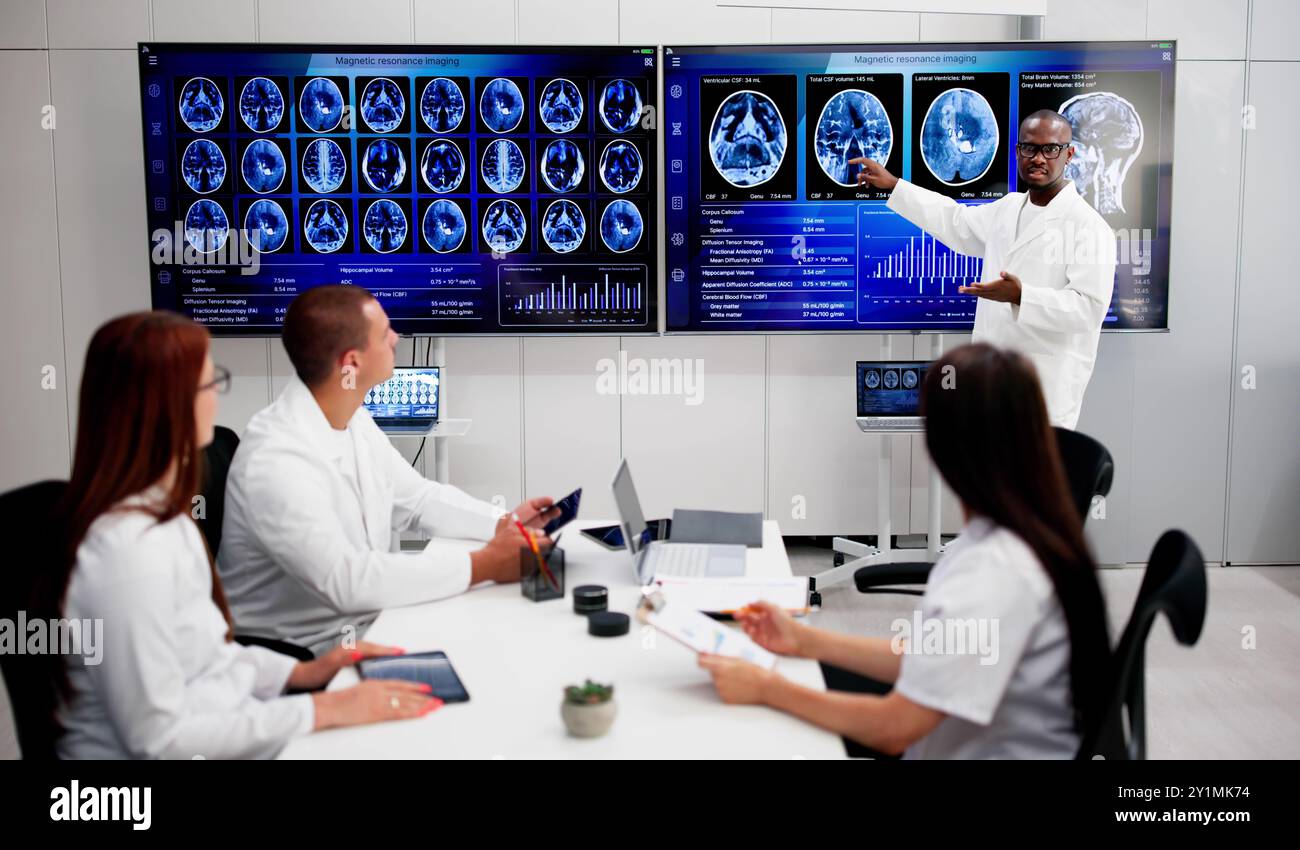 Doctors In Clinic Looking At Brain MRI Scan. Neurology Diagnosis Stock ...