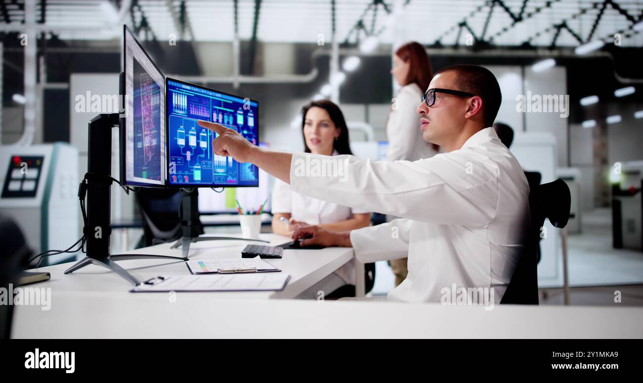 Engineer Operators Using Scada System At Industrial Plant Stock Photo - Alamy
