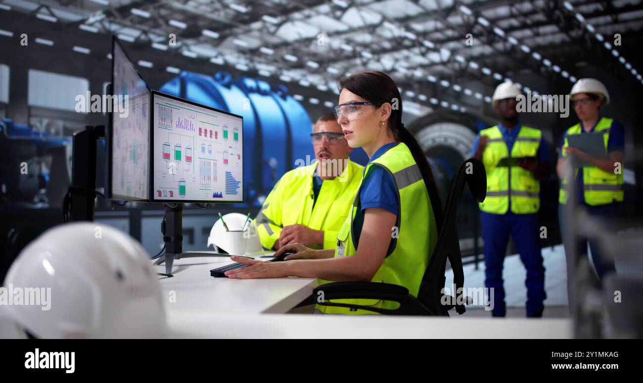 Engineer Operators Using Scada System At Industrial Plant Stock Photo - Alamy