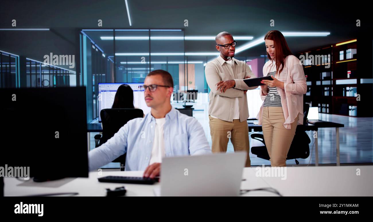 Business team using technology hi-res stock photography and images - Alamy