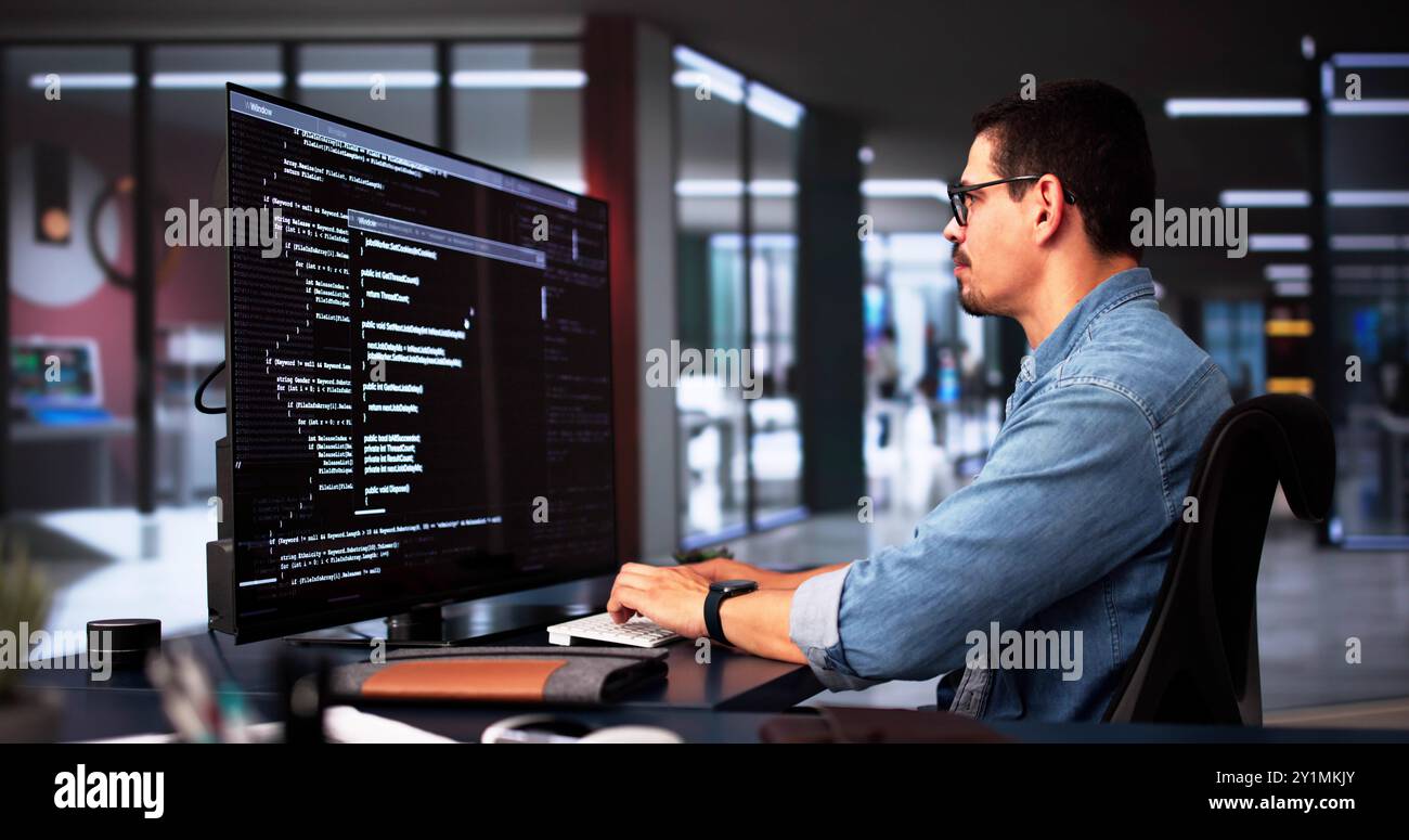 Web Developer Coding On Computer To Develop Code Stock Photo - Alamy
