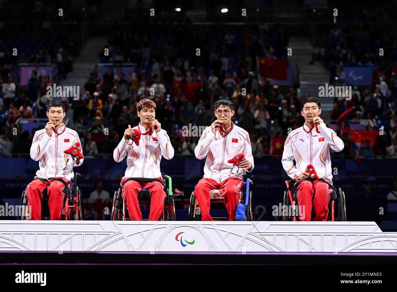 Paris, France. 7th Sep, 2024. Gold medalists team China pose during the awarding ceremony for ...