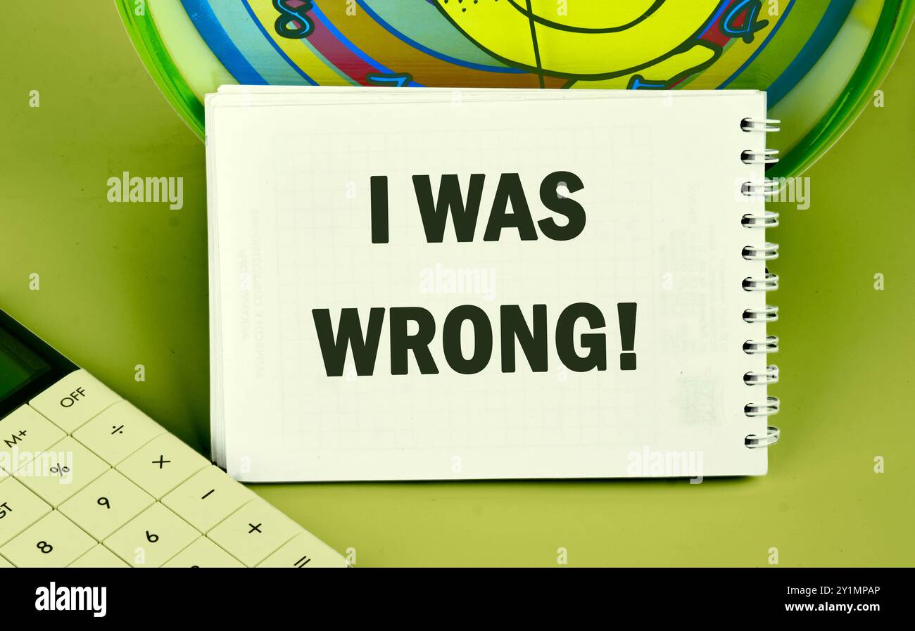 I WAS WRONG text written in the notebook, the front view Stock Photo ...