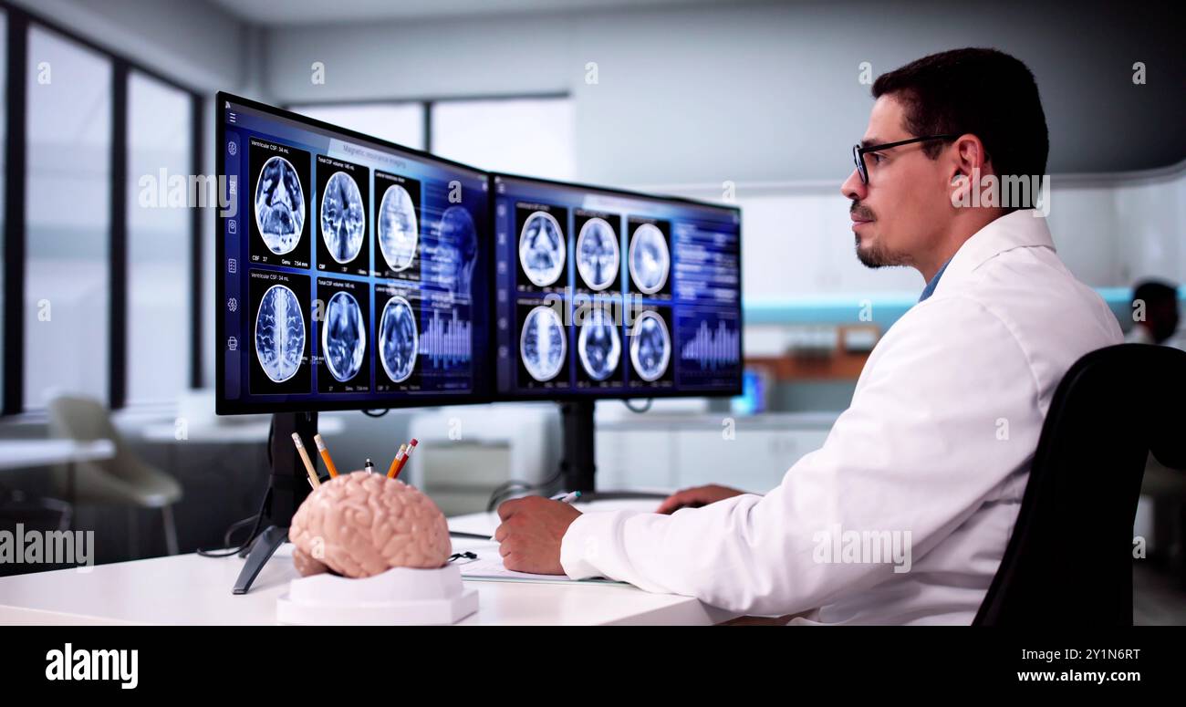 Doctors In Clinic Looking At Brain MRI Scan. Neurology Diagnosis Stock ...