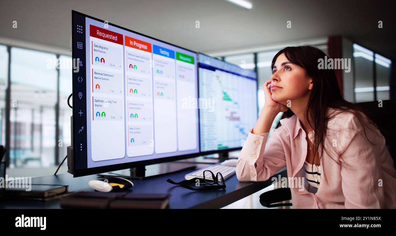 Tired Lazy Woman At Office Desk. Bored Employee Stock Photo - Alamy
