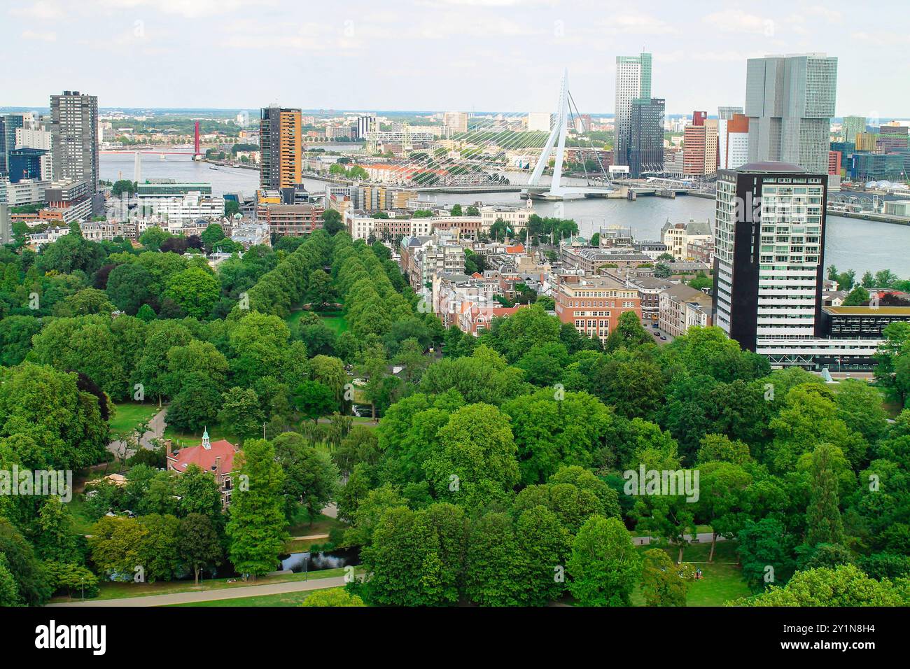 A panoramic view of a city skyline featuring modern buildings, a river ...