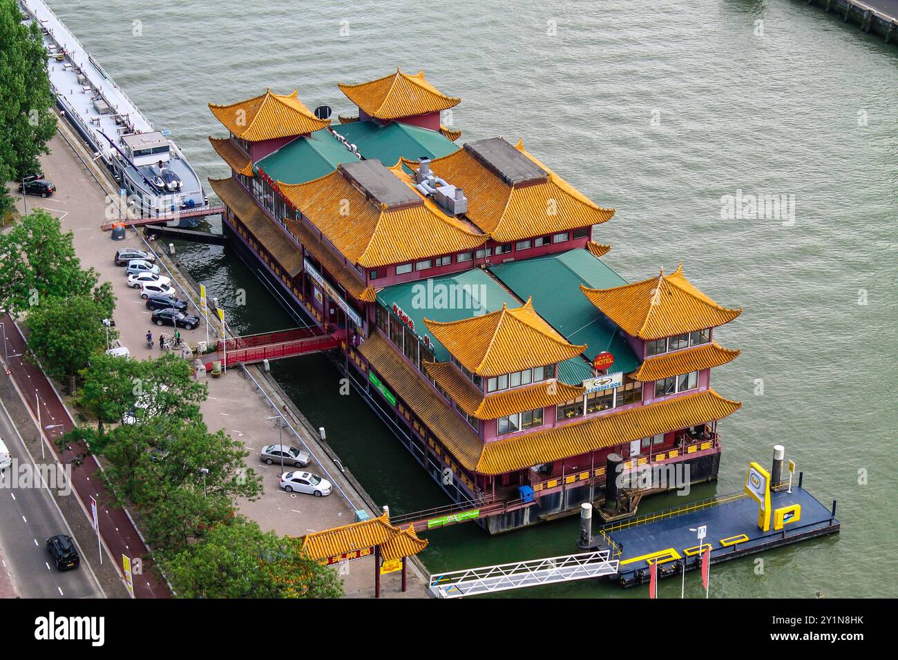 Aerial view of a traditional Chinese restaurant on water, featuring ...