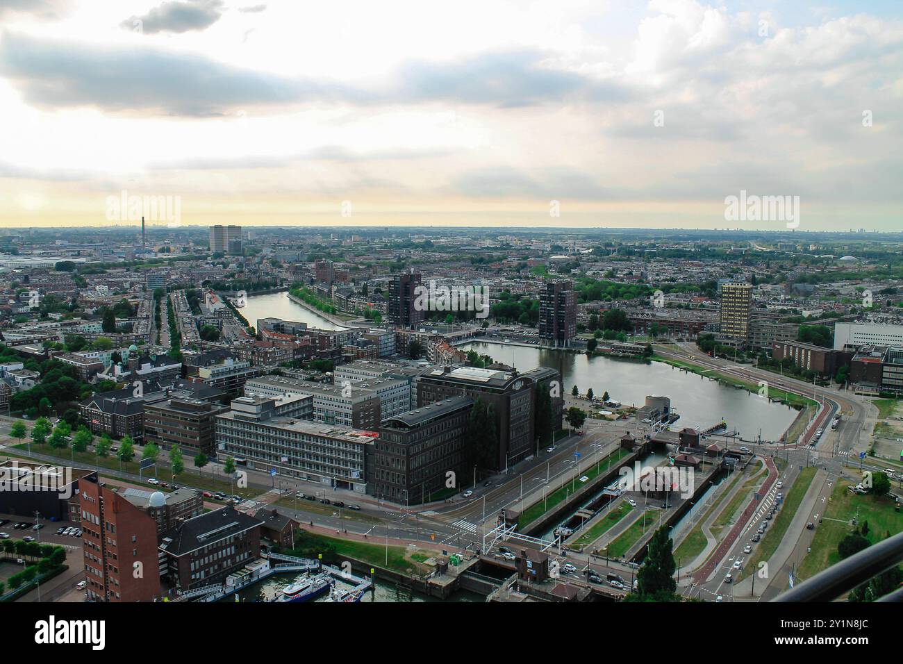 A panoramic view of a cityscape featuring rivers, modern buildings, and ...