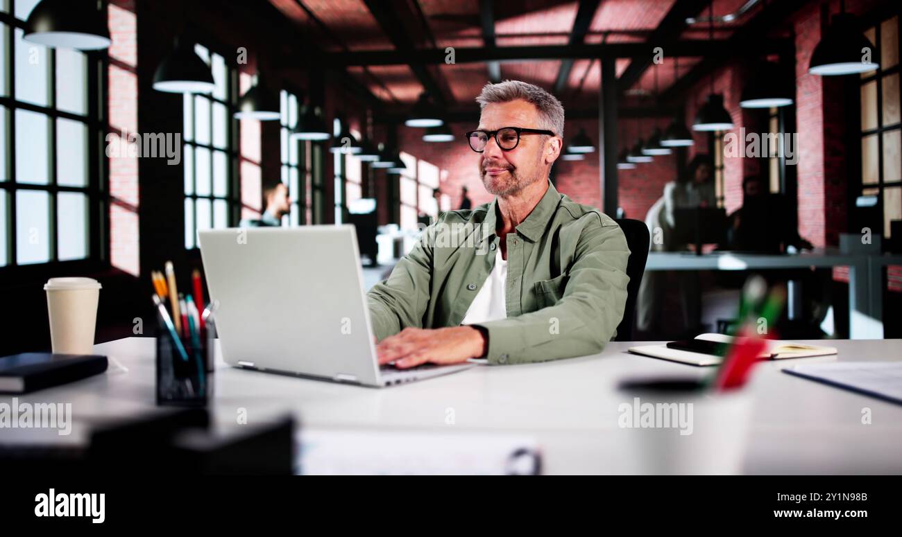 Business Man Director Using Laptop. CEO With A Vision Stock Photo - Alamy