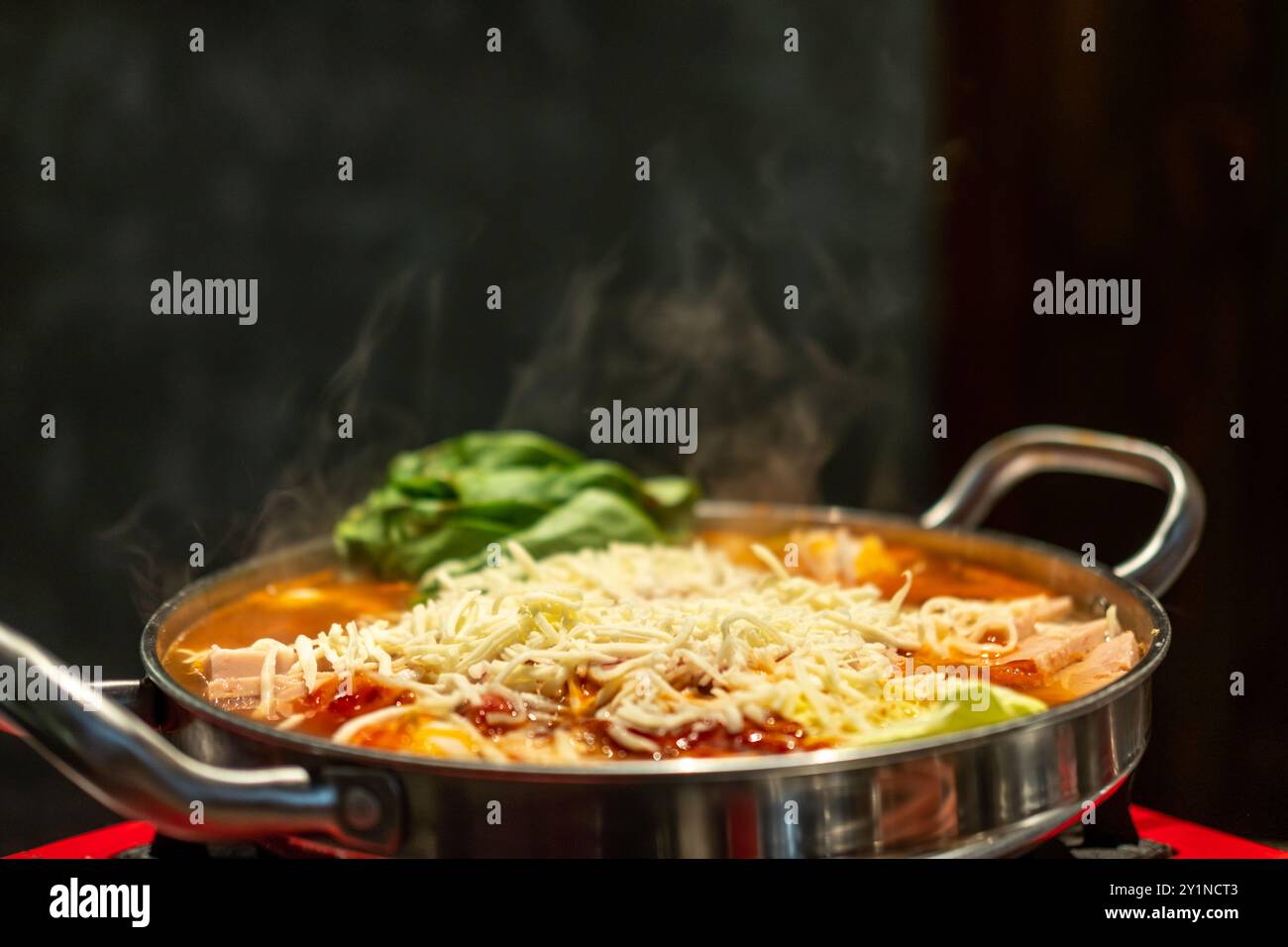 Korean hot pot, Ramyeon and Tteokbokki in Kimchi soup with vegetable ...