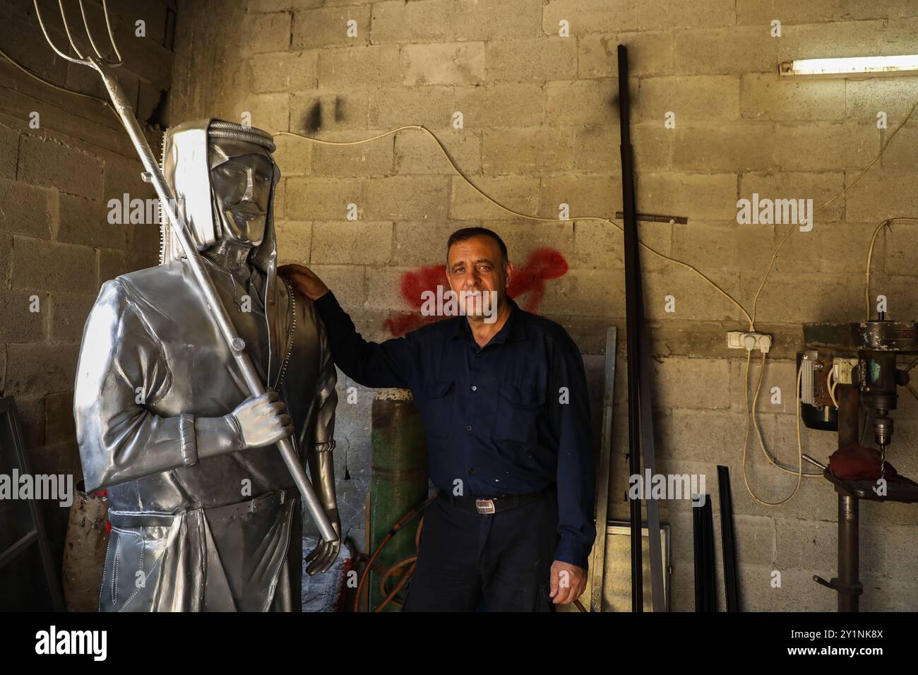 A statue from hardened steel of the Palestinian popular folkloric ...