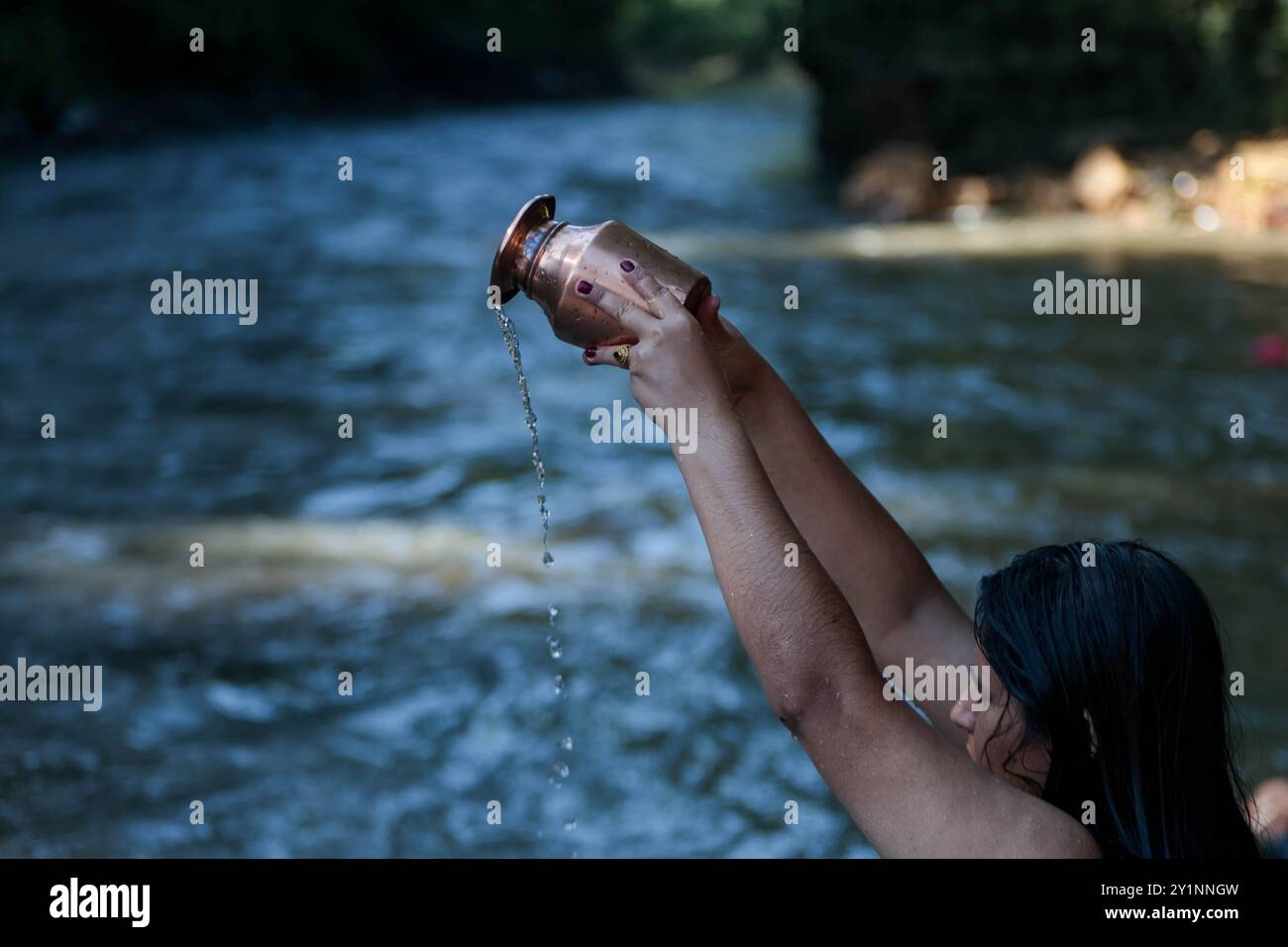 Kathmandu, Nepal. 8th Sep, 2024. A Hindu woman performs a ritual in the ...