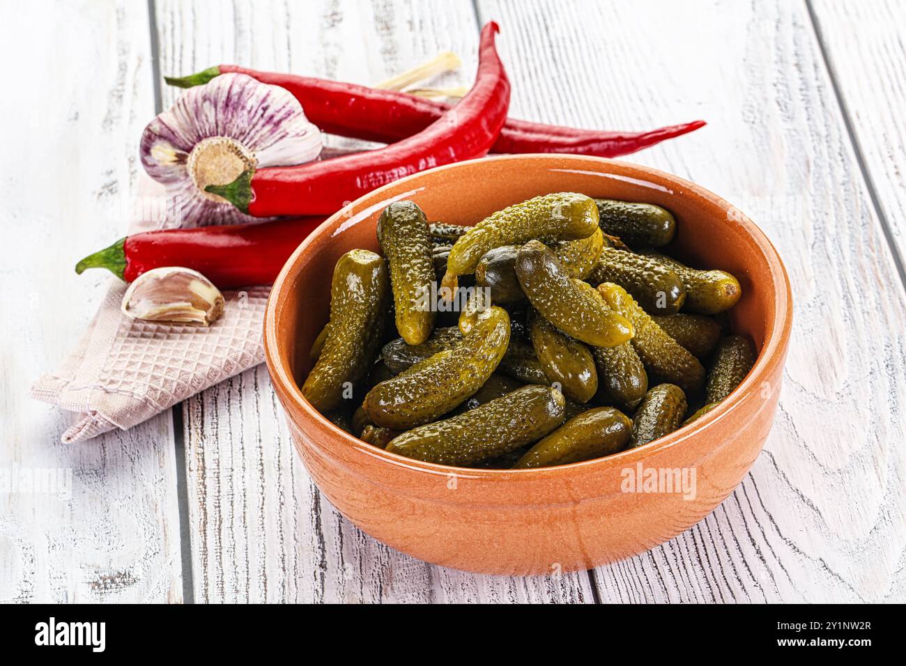 Marinated small cucumbers - cornichon - in the bowl Stock Photo - Alamy