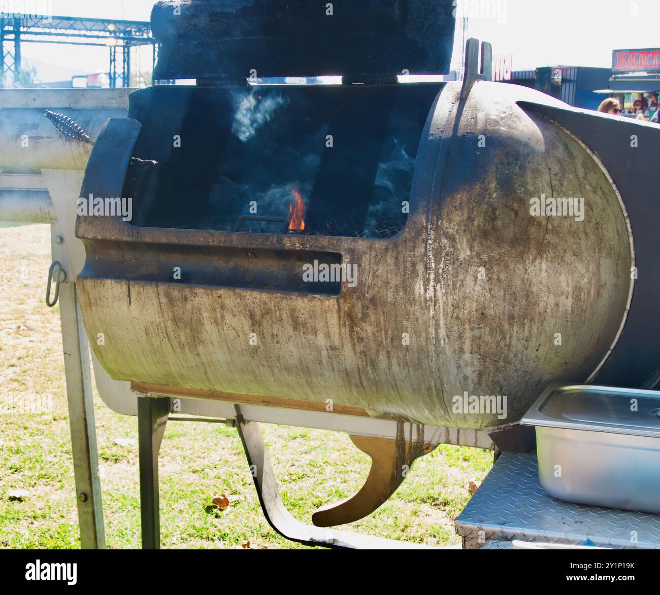 Revolver shaped barbecue grill used by the Vacarnal burger stand at the ...