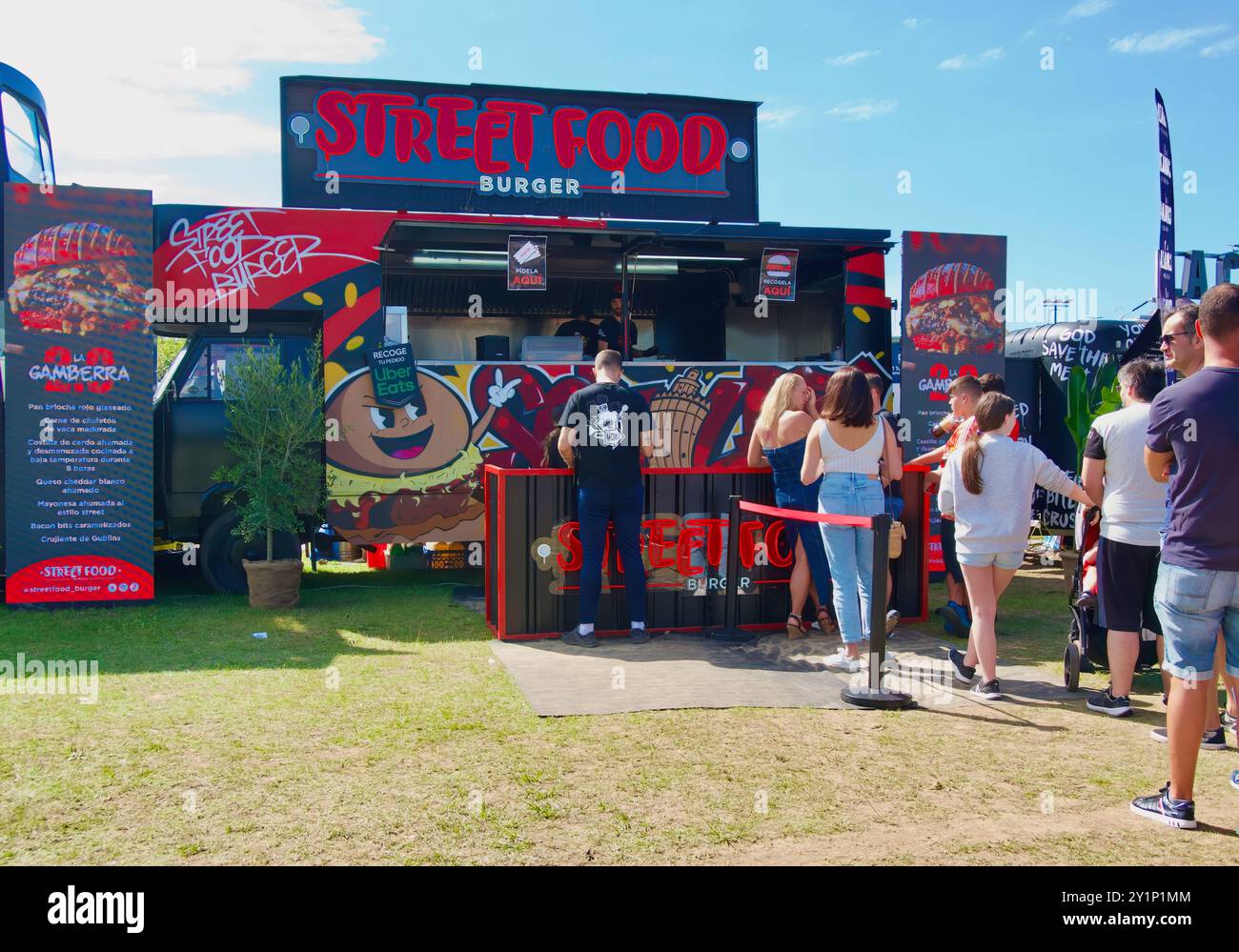 People queueing at the Street Food Burger food truck The Champions ...