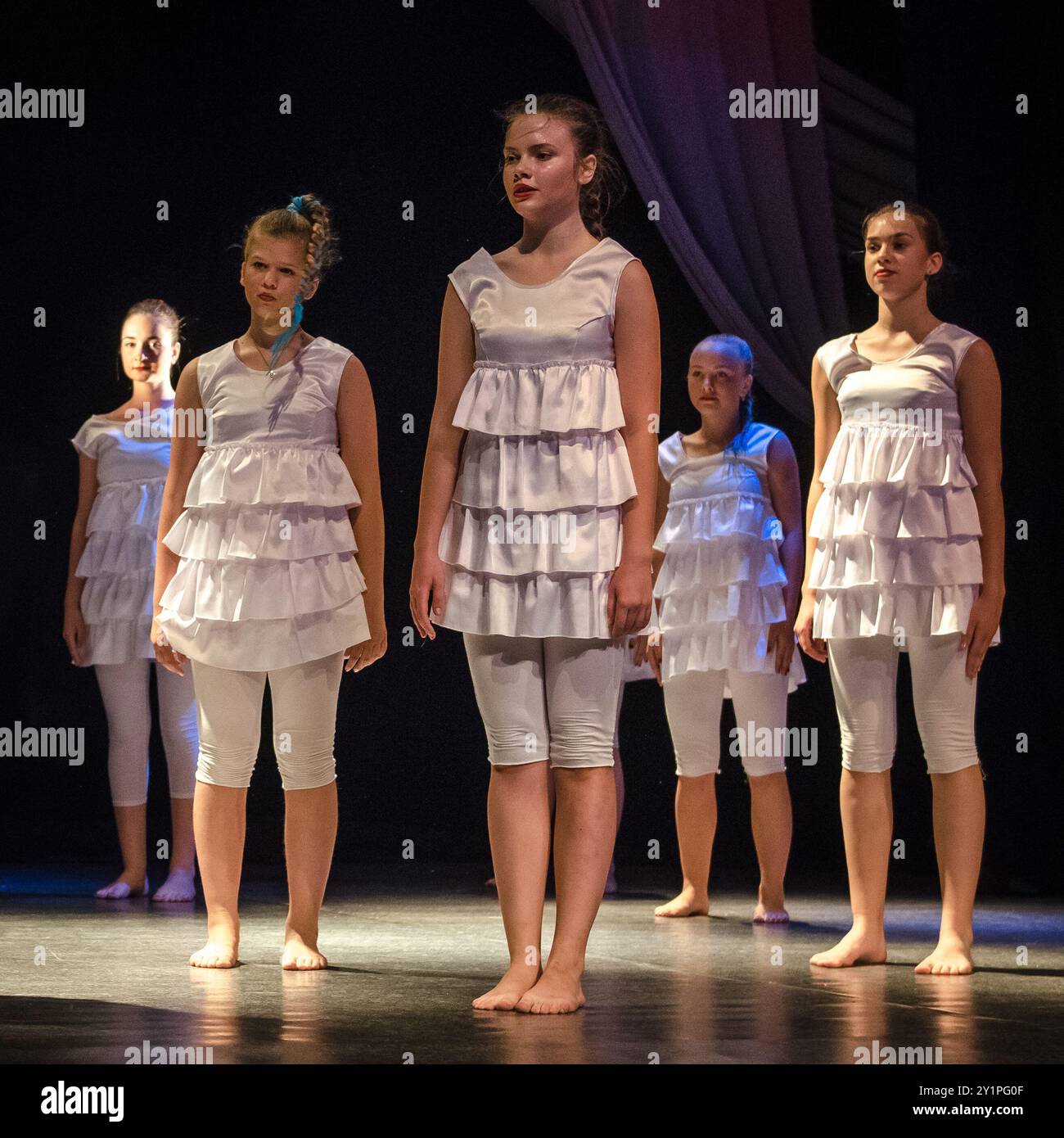 staging on the stage of a children's theater with actors in the light ...