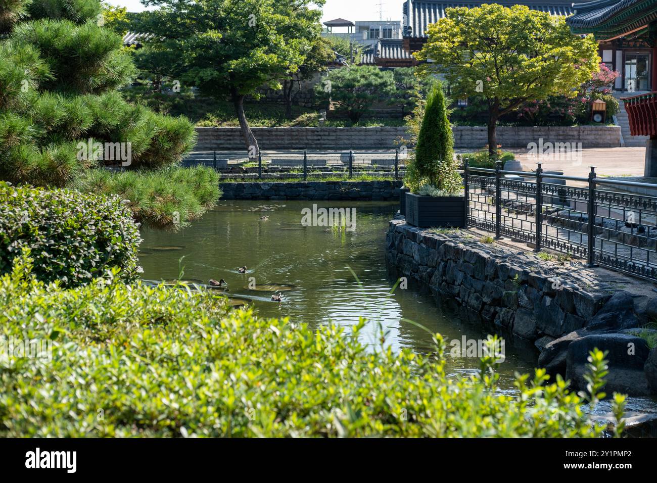View of the pond and garden in Namsangol Hanok village, a recreated ...