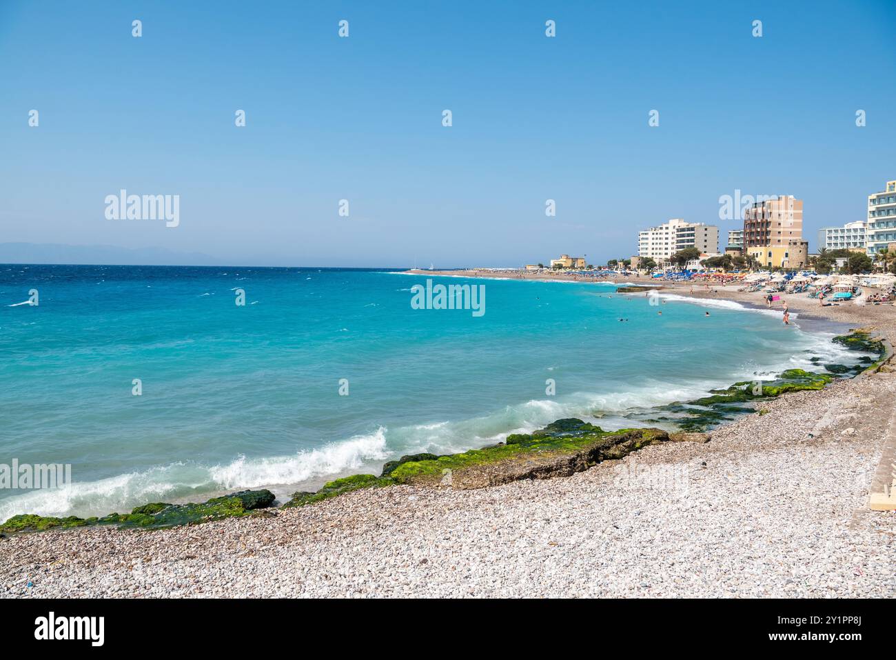 Elli Beach in Rhodes Town, Greece. View with unidentifiable figures of ...
