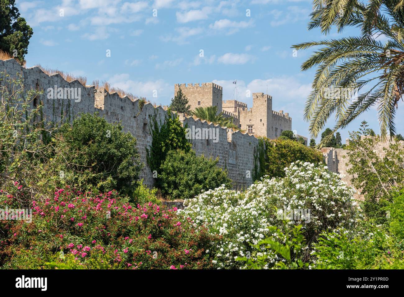 Stone walls of Rhodes Old Town and the Palace of the Grand Master in ...