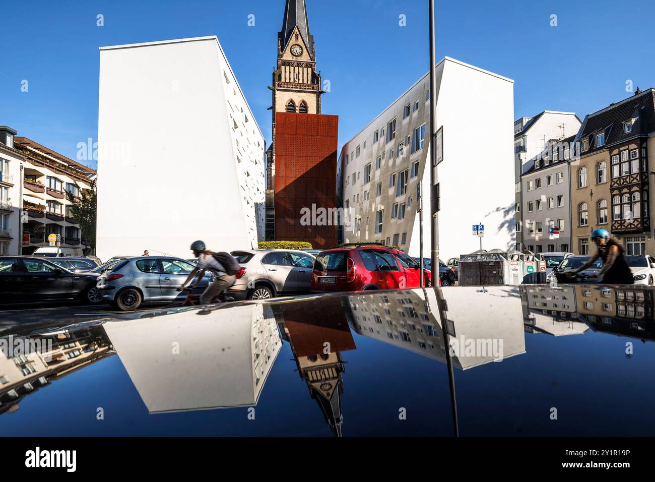 the Protestant Christ Church in the Belgian Quarter is reflected in a ...