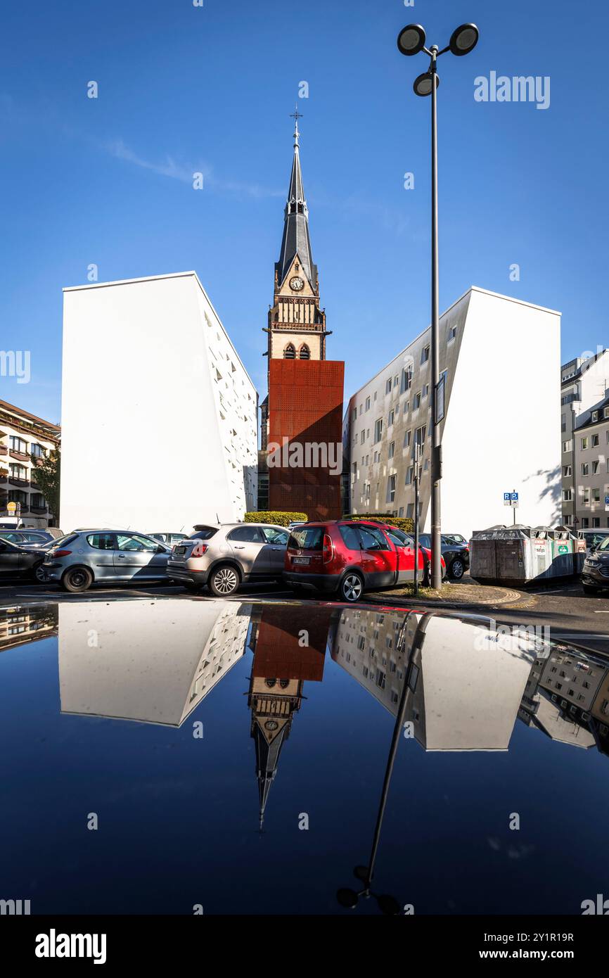 the Protestant Christ Church in the Belgian Quarter is reflected in a ...