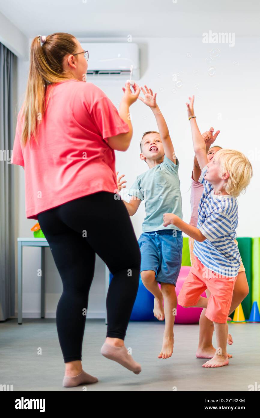 Group therapy session kids hi-res stock photography and images - Alamy