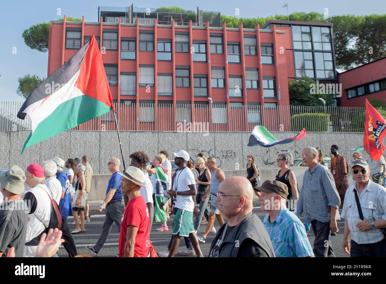 Rome, Italy. 7th Sep, 2024. A person waves the Palestinian flag during ...