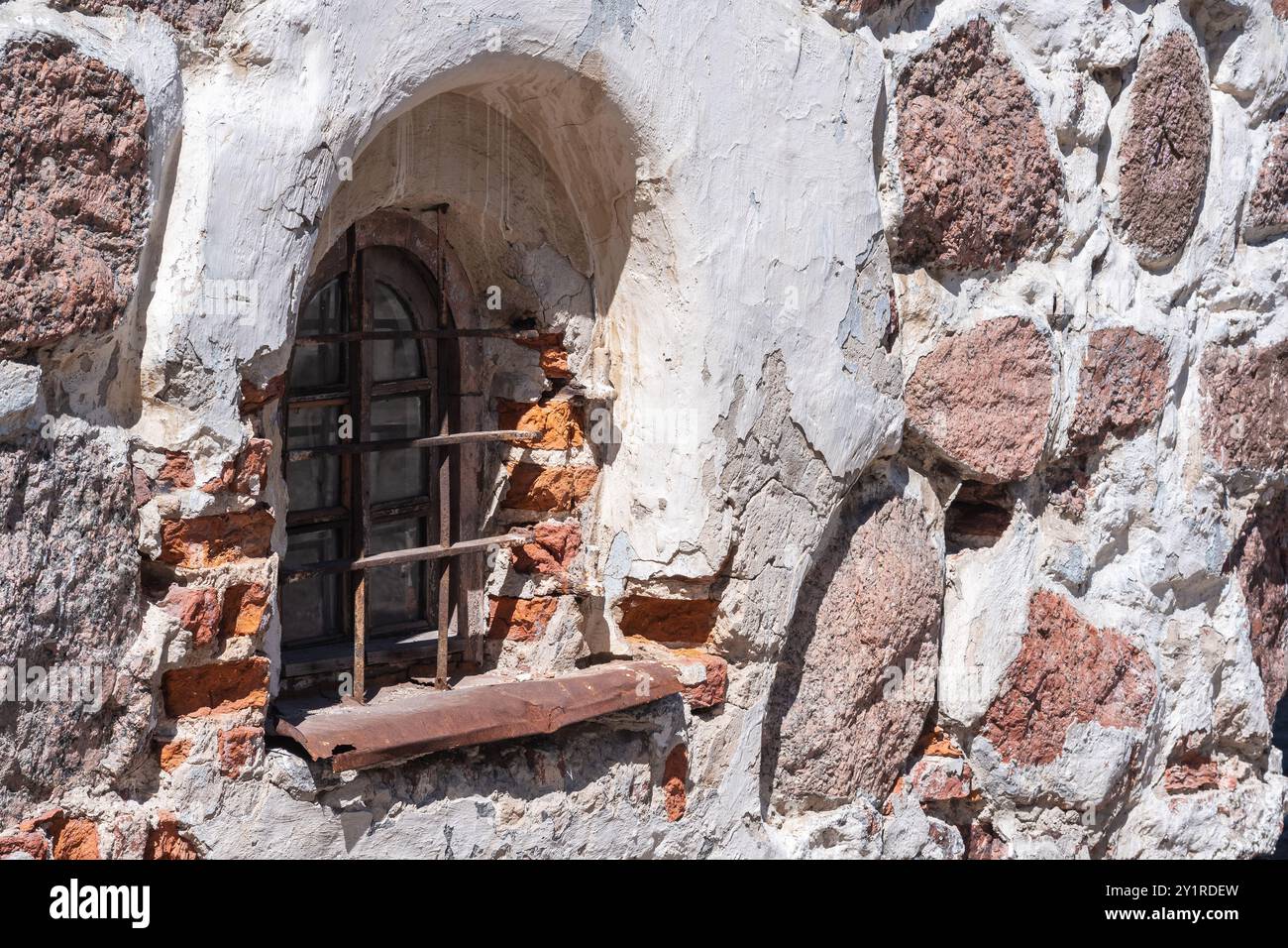 small window in the stone wall of a medieval building Stock Photo - Alamy