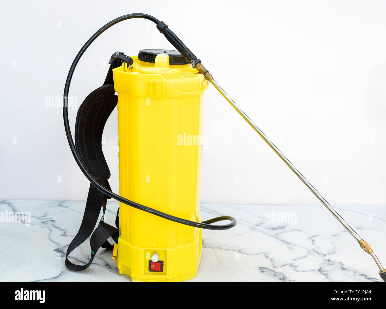 Side view of a battery powered pesticide sprayer machine Stock Photo ...