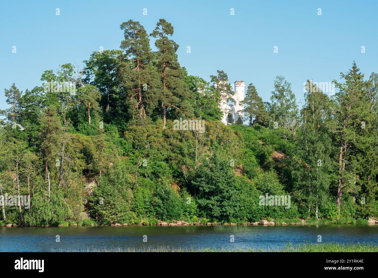 ancient building on a wooded island Stock Photo - Alamy