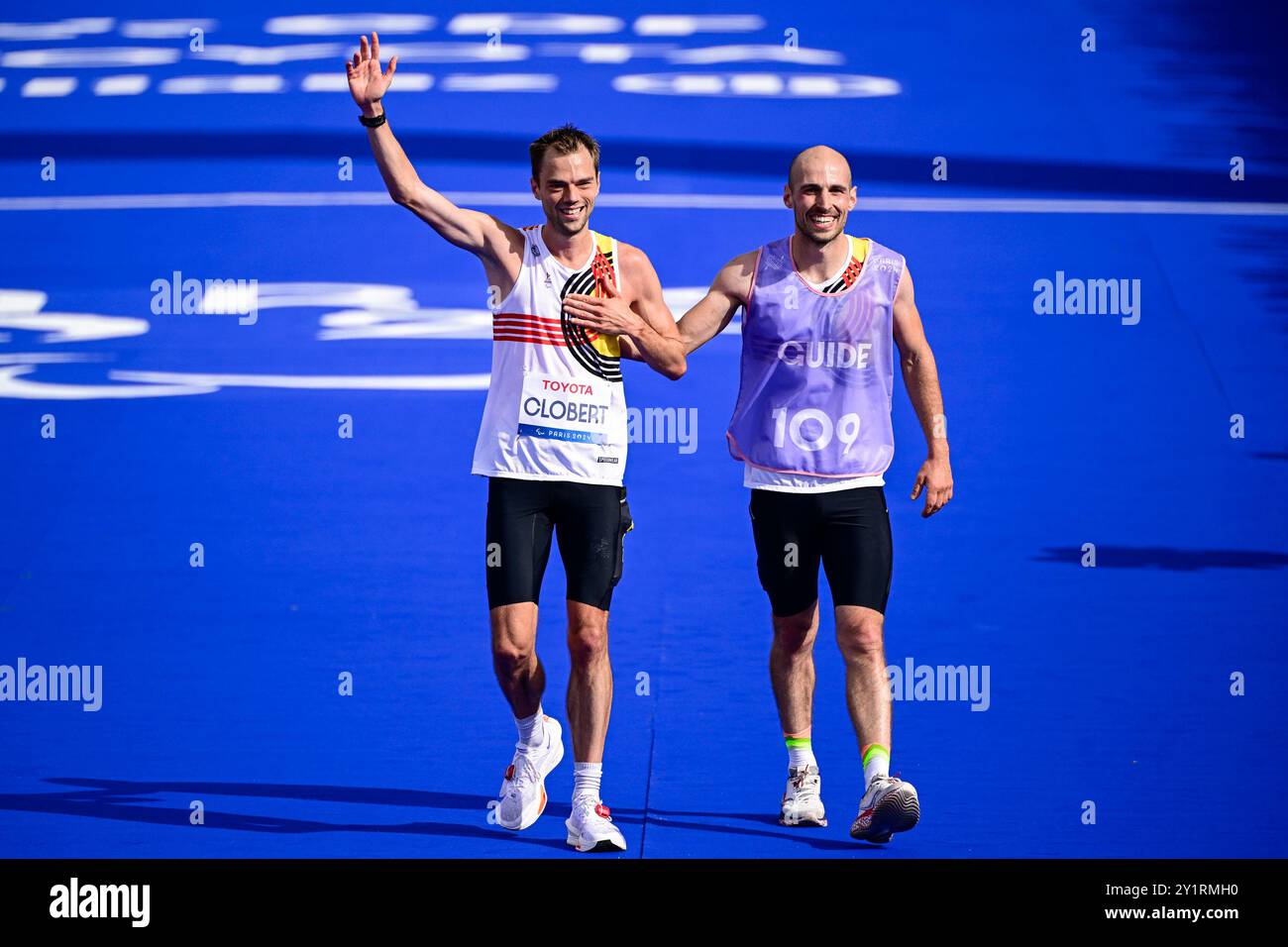 Belgian Martin Clobert and his guide Sebastien Thirion celebrates as ...