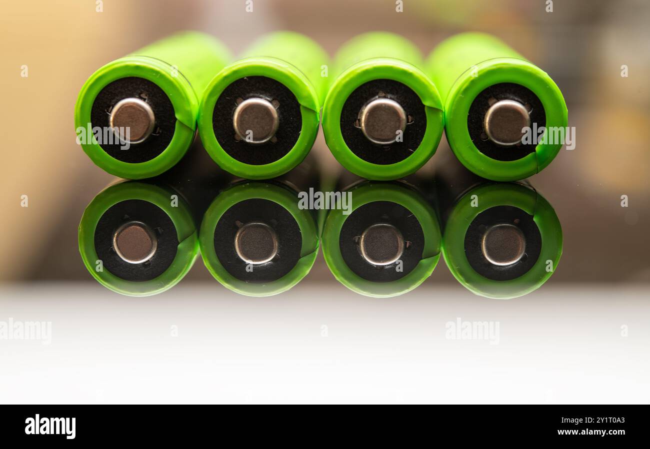 Modern AAA batteries in vibrant green casing reflect the push towards ...