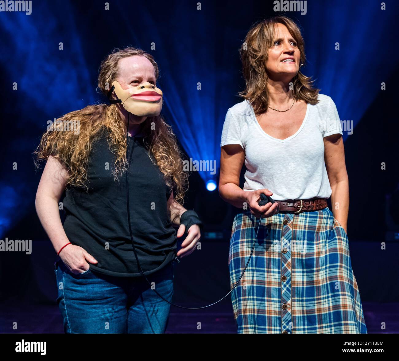 Ventriloquist Nina Conti and member of audience wearing a silly mask at ...