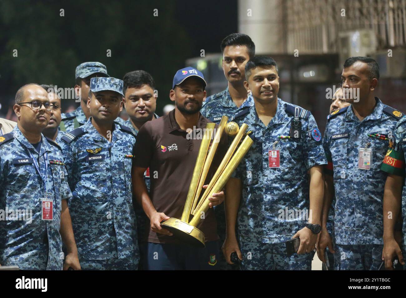 Members of the Bangladesh Air Force pose for a photo with the historic ...