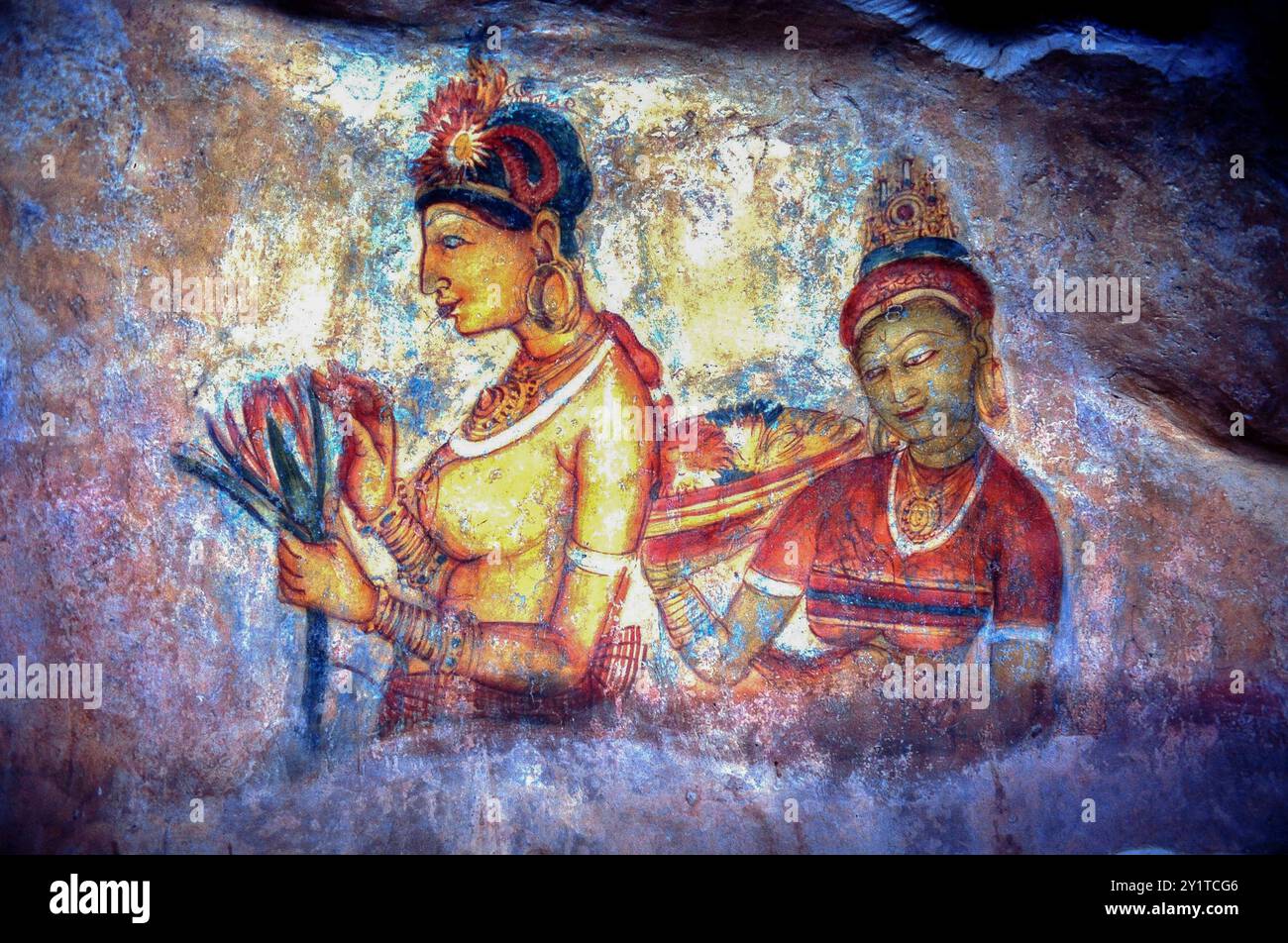Sigiriya, Sri Lanka. Famous paintings of the cloud girls in the rock of ...