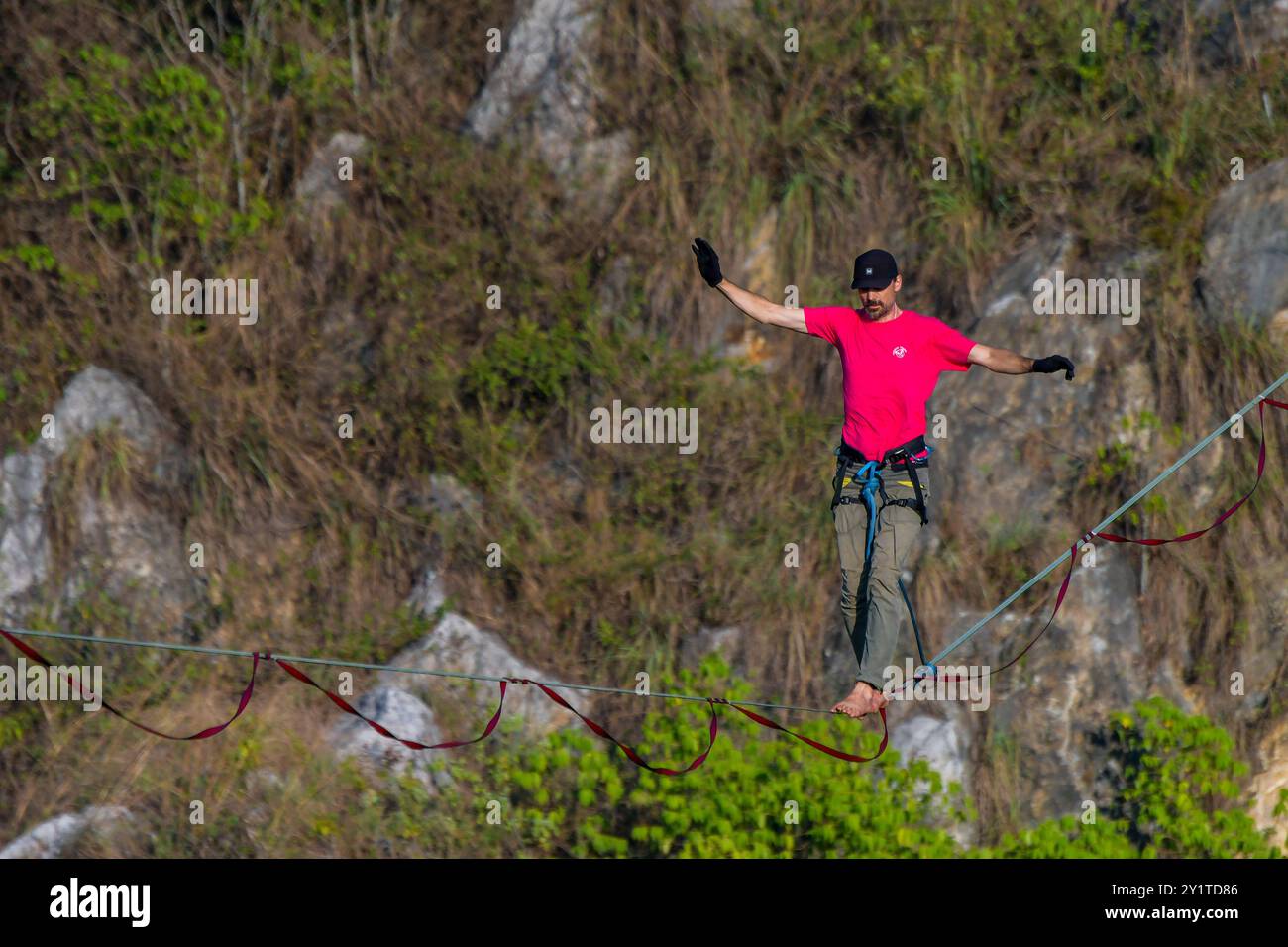 INDONESIA HIGHLINE FESTIVAL Extreme sports athletes walk on a tightrope ...