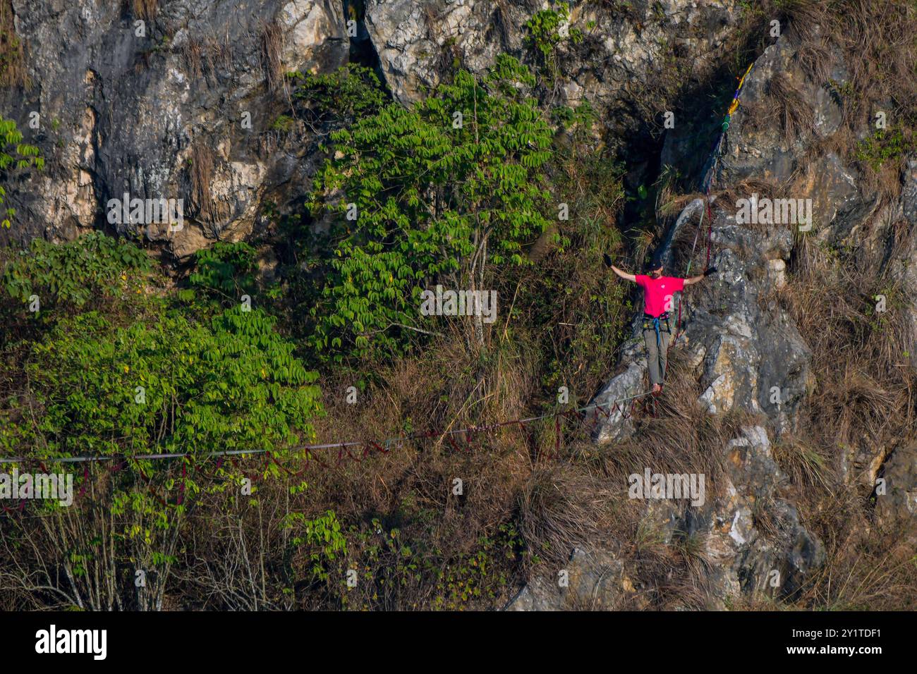 INDONESIA HIGHLINE FESTIVAL Extreme sports athletes walk on a tightrope ...