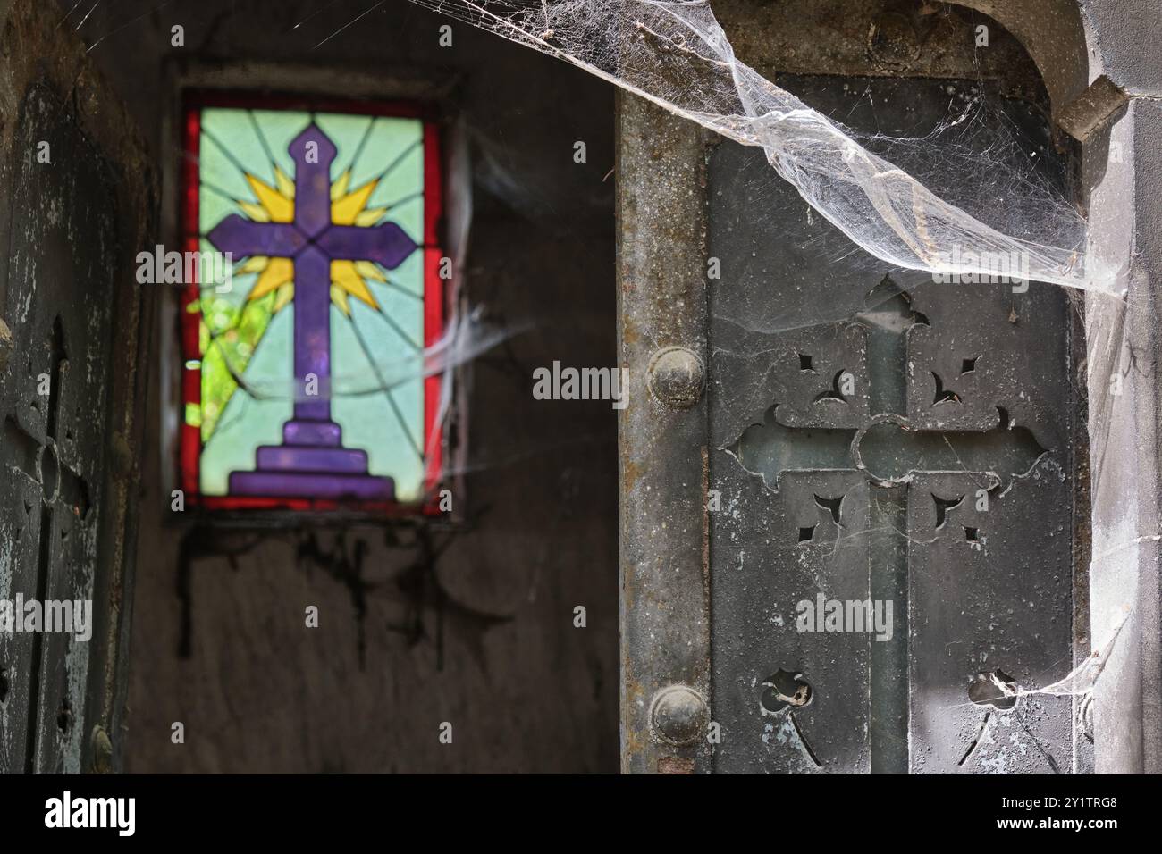 Image of the cross in stained glass window in a mausoleum in the Pere ...