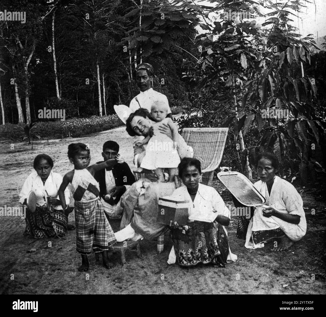 German woman and baby with native people on family on holiday in ...