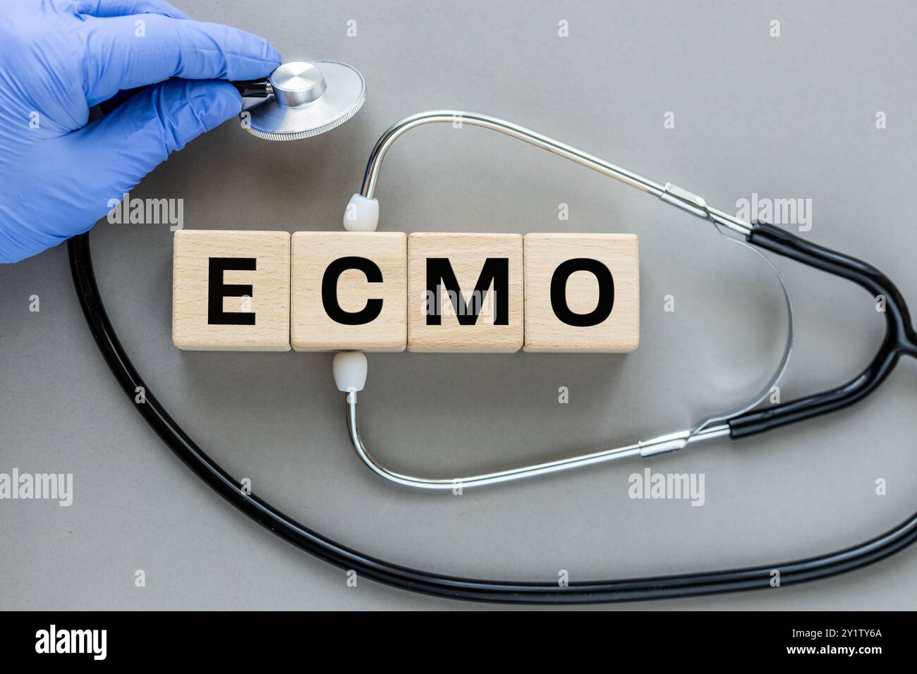 Word ecmo written on wooden cubes. Healthcare concept for hospital ...