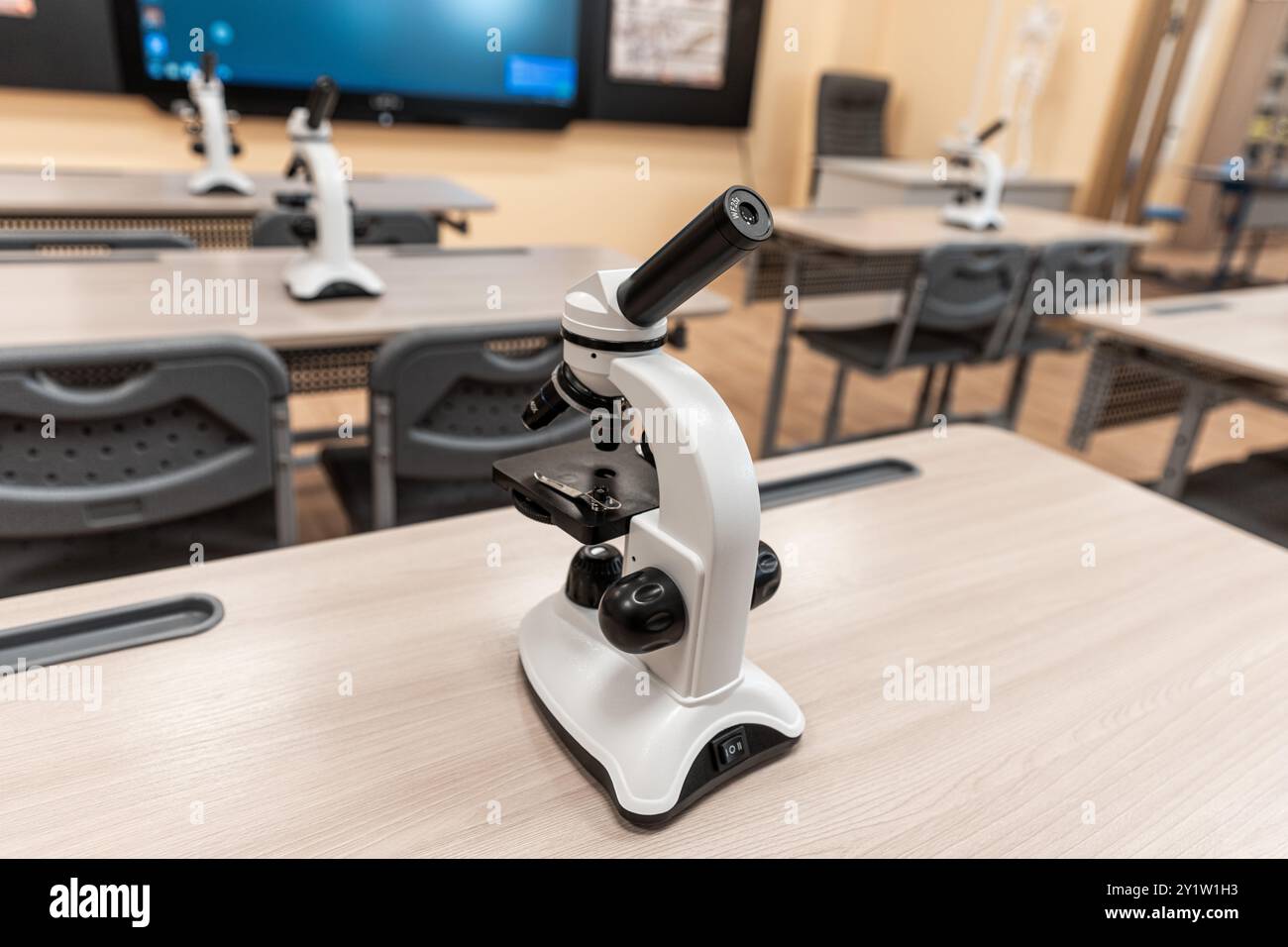 Microscopes classroom desks hi-res stock photography and images - Alamy