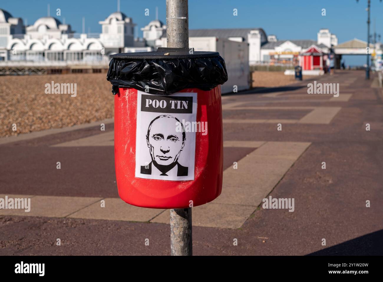 Dog poop bin that someone has added an image of Vladimir Putin to with ...