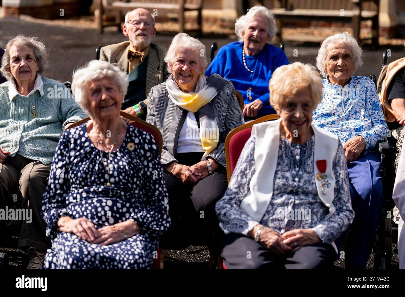 Veteran Jean Cheshire poses for a group photograph infront of Bletchley ...