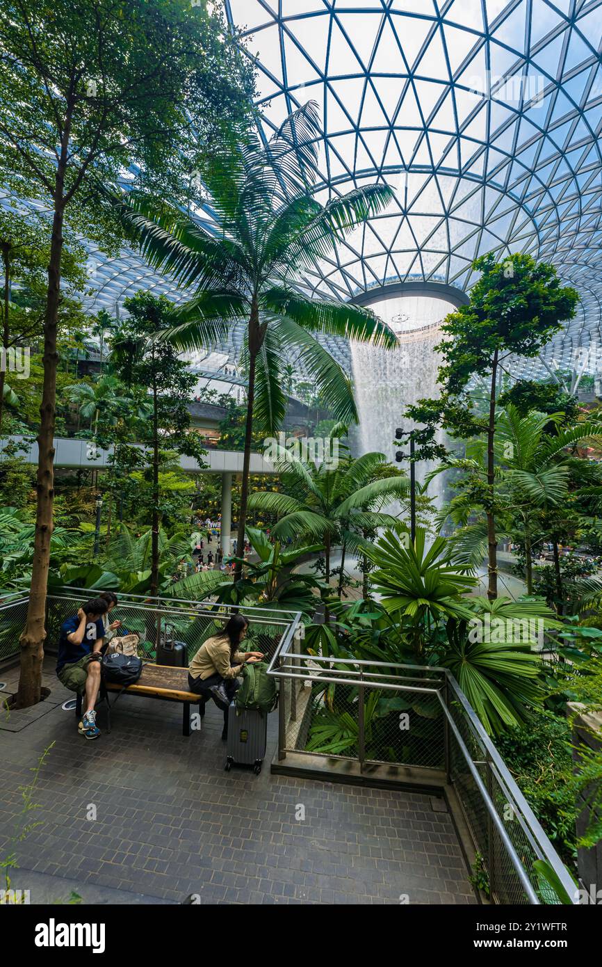 Singapore - Jun 13 2024 : The Rain Vortex, a 40m-tall indoor waterfall ...