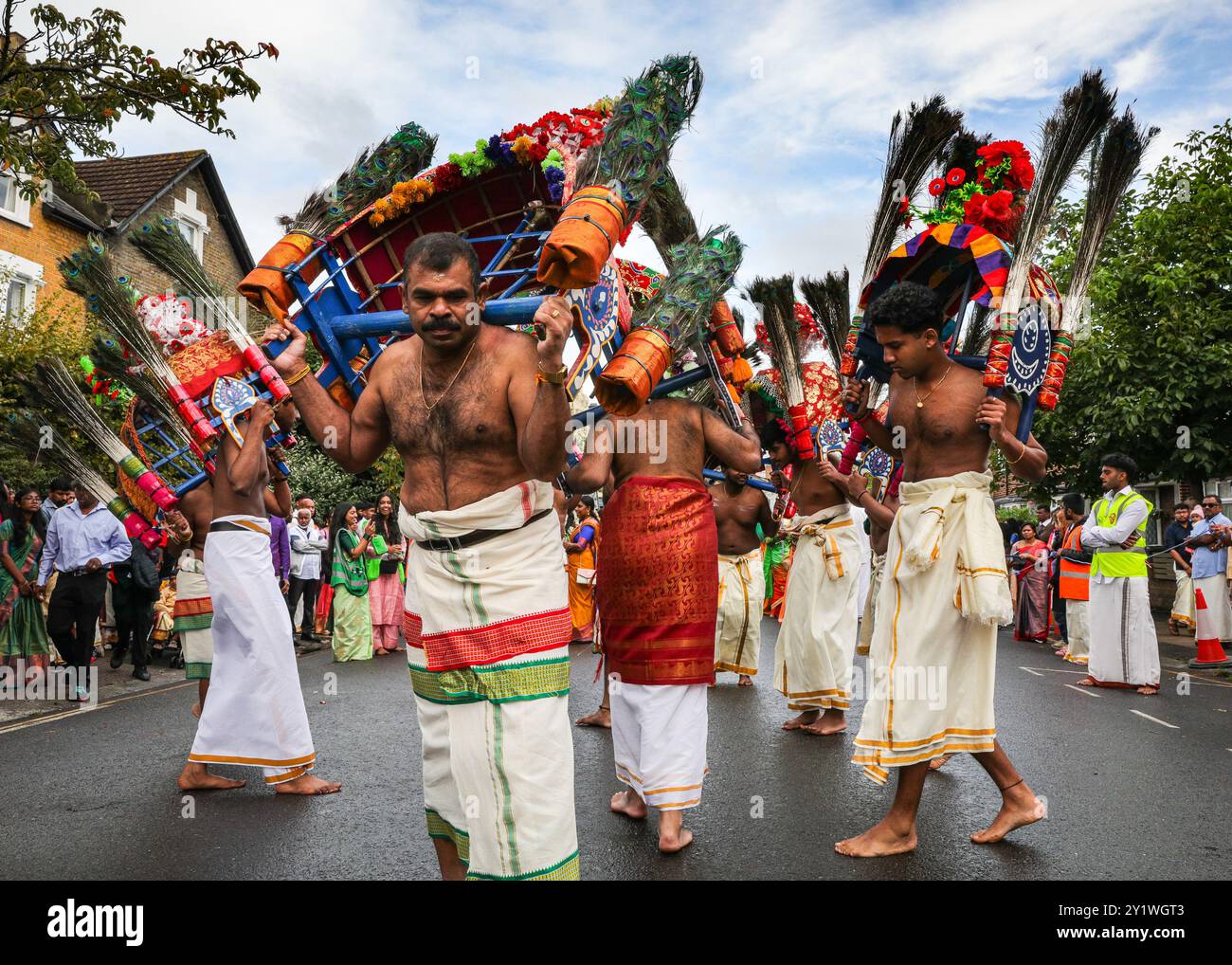 London, UK. 08th Sep 2024. A group of male dancers perform the Kavadi ...