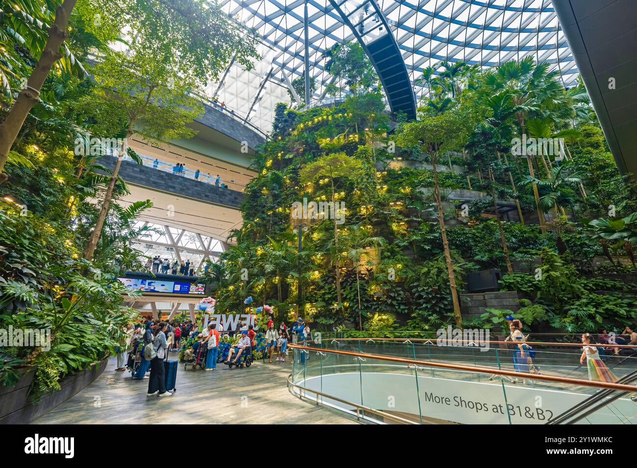 Singapore - Jun 13 2024 : The Rain Vortex, a 40m-tall indoor waterfall ...