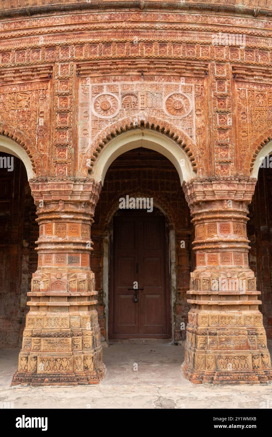 Entrance arch decorated with terracotta carvings in Pancha Ratna ...