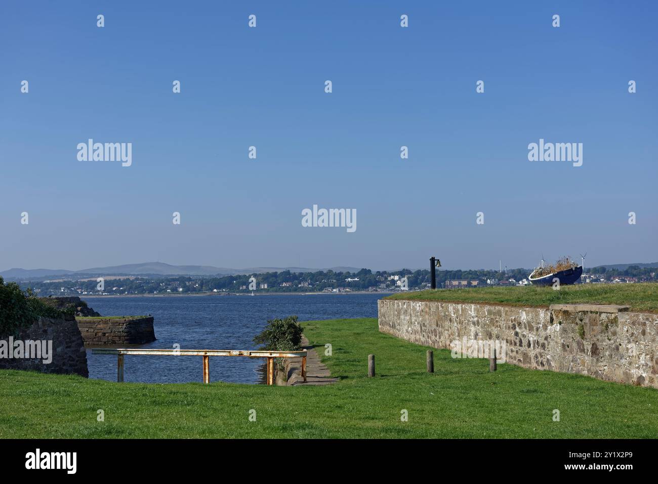 The double stone wall covered with a layer of Grass of Tayports small ...