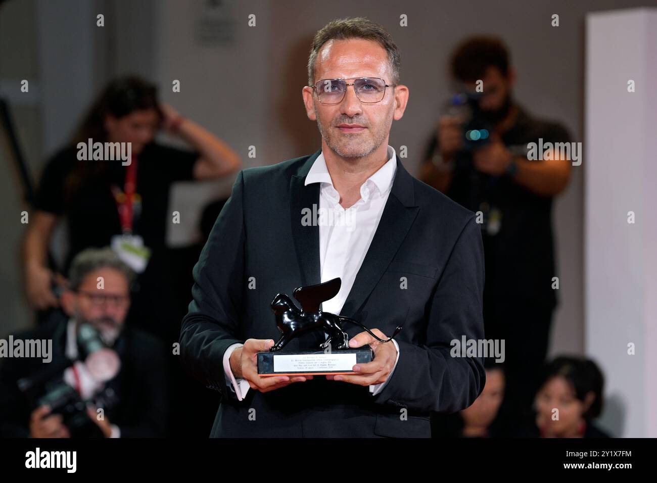 Venice, Italy. 07th Sep, 2024. Bogdan Muresanu poses with the Lion for ...